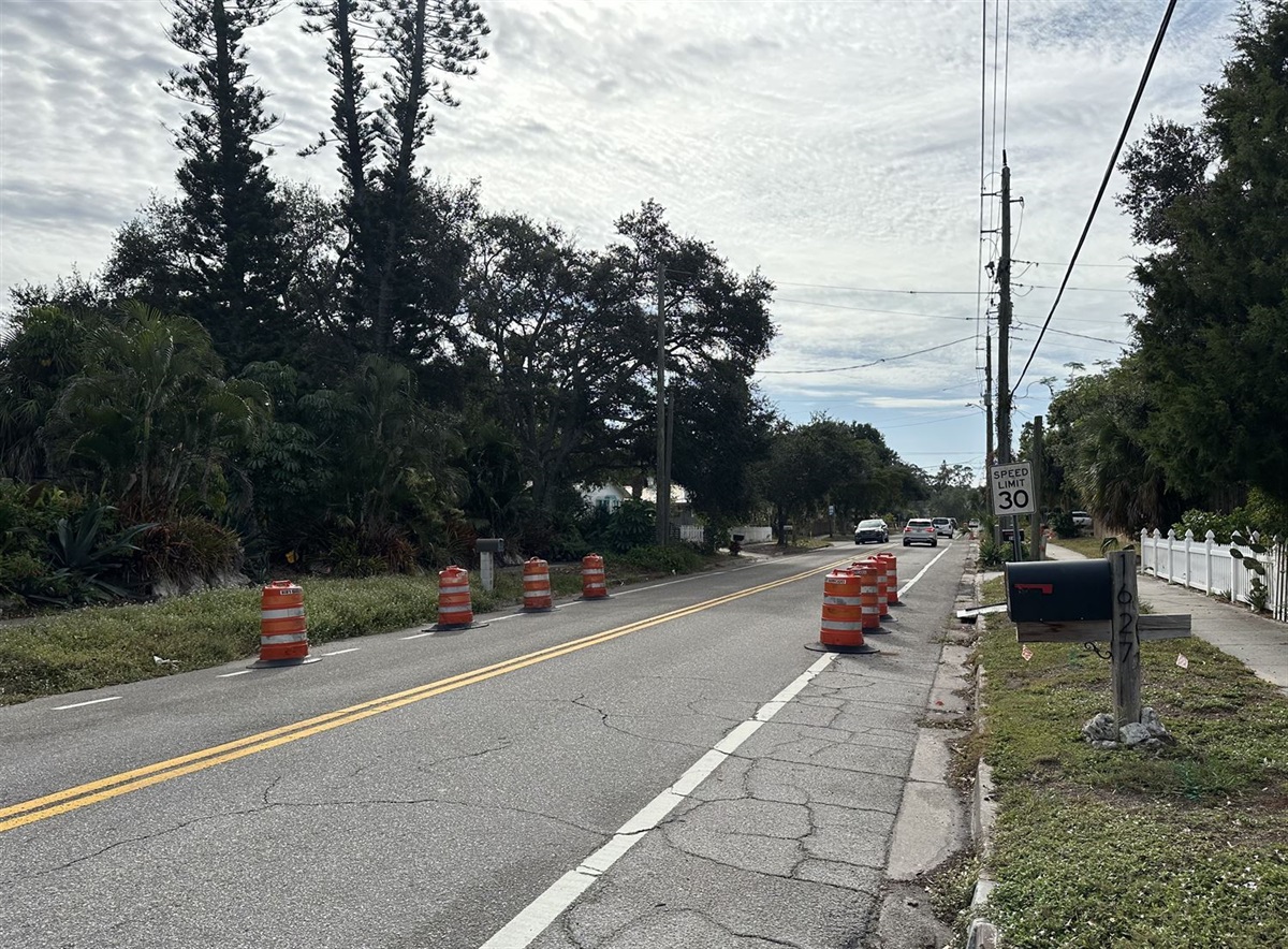 Construction barrels serve as temporary traffic calming mechanism ...